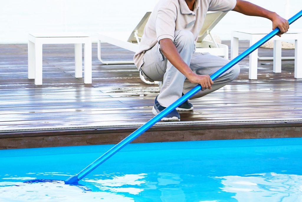 How to Properly Clean Your Inground Pool - LANDMARK EXTERIORS